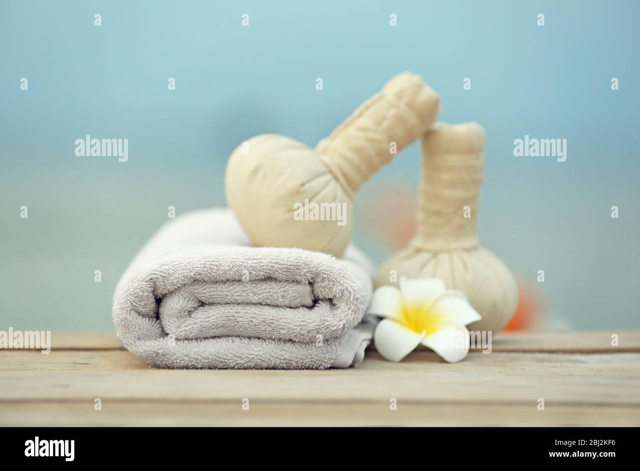 Massage bags with flowers outdoors Stock Photo - Alamy