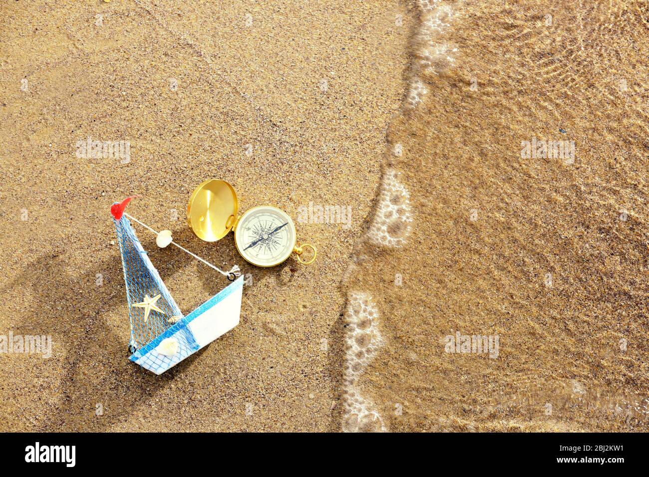Beautiful sea composition on sand beach background Stock Photo - Alamy