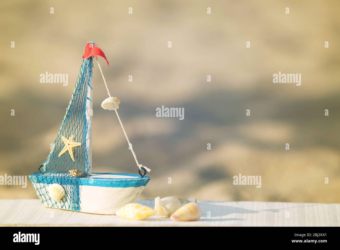 Beautiful sea composition with ship on sand beach background Stock ...