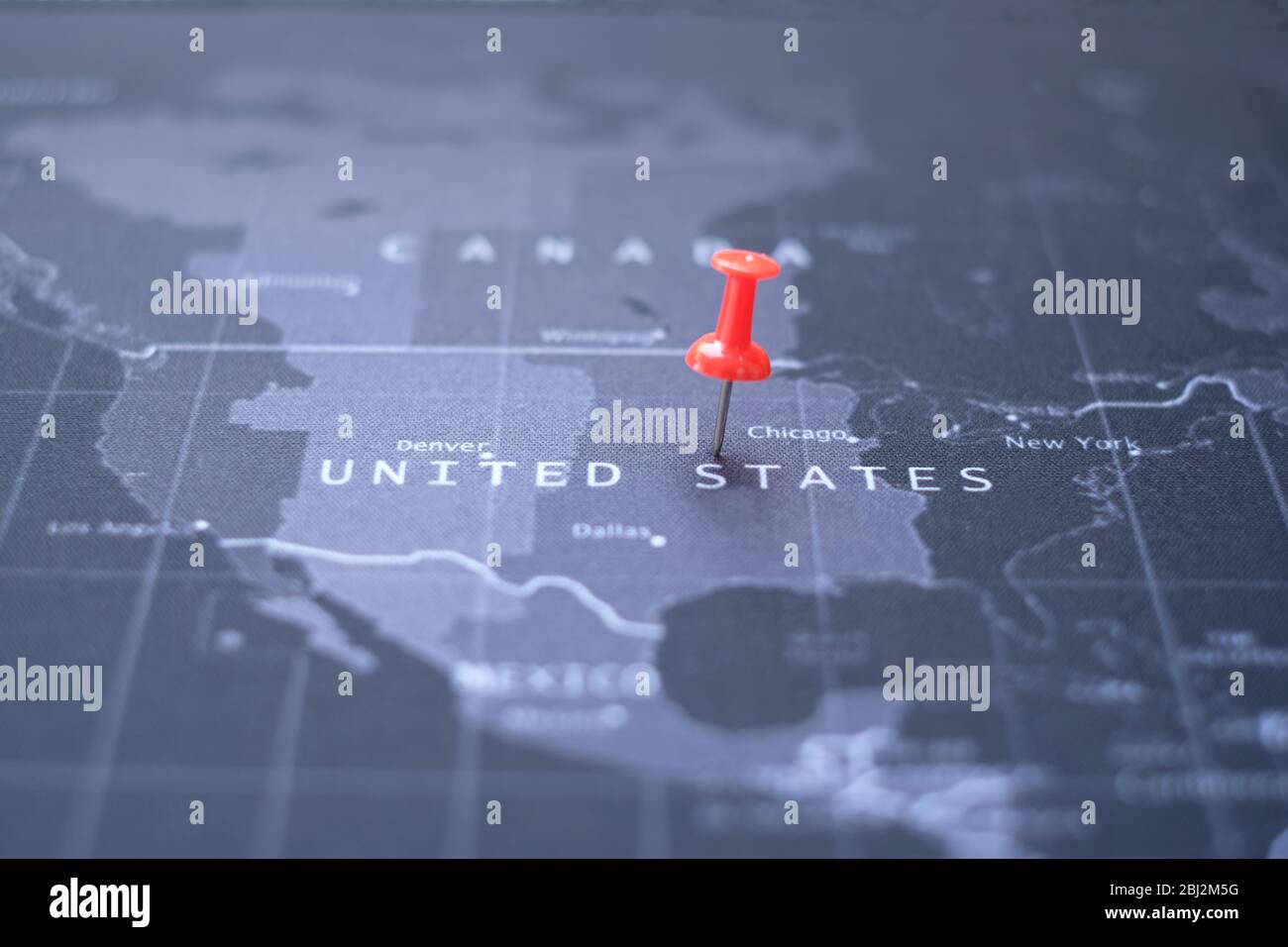 World map focus United States, blur map and selective focus on red pin ...