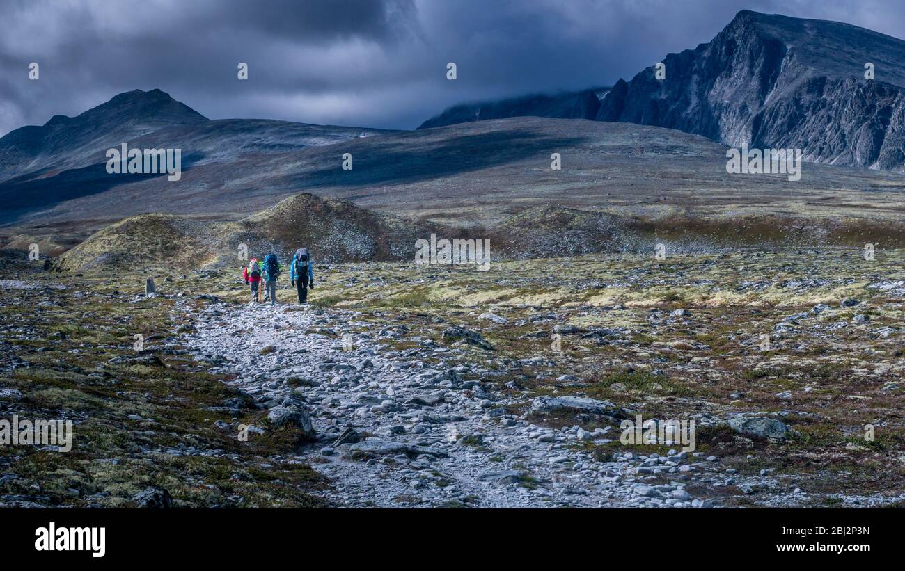 Norway, in the summer, hiking in Rondane National park with children ...