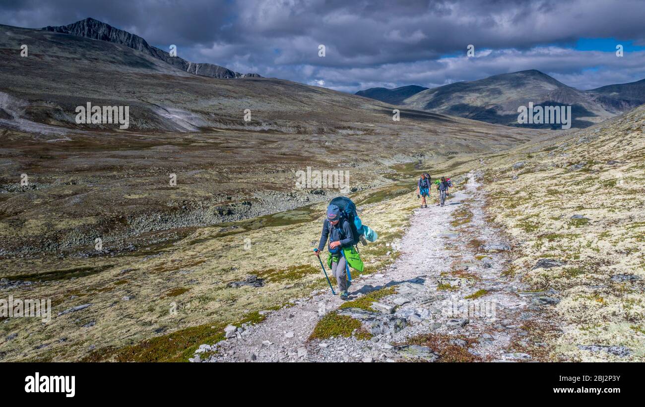Norway, in the summer, hiking in Rondane National park with children ...