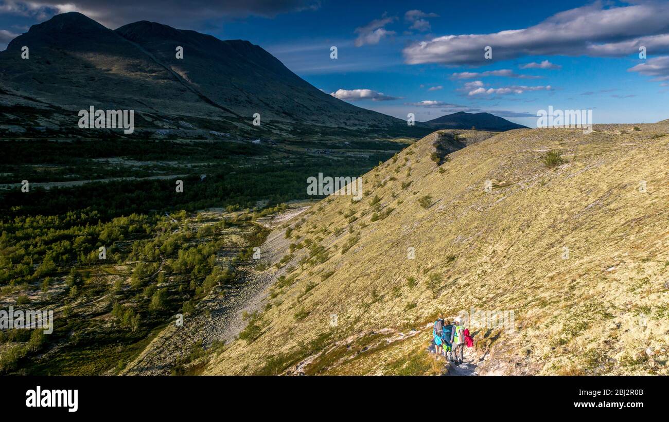 Norway, in the summer, hiking in Rondane National park with children ...