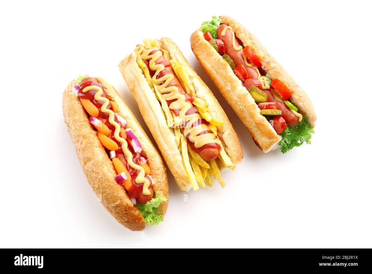 Three fresh hot dogs isolated on white Stock Photo - Alamy