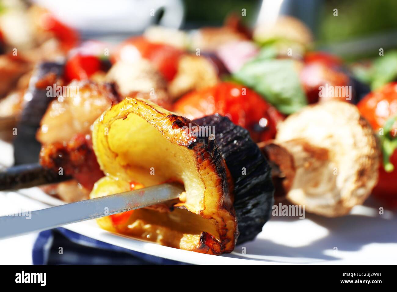 Barbecue on plates outdoor Stock Photo - Alamy