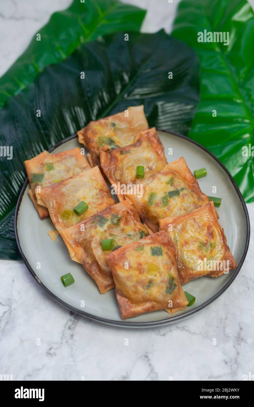 Martabak telur mini, Indonesian street food. fried wrap filled with ...