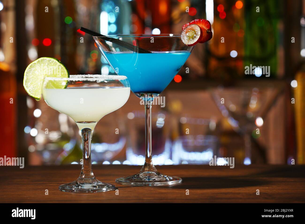 Glass of cocktail on the bar counter Stock Photo - Alamy
