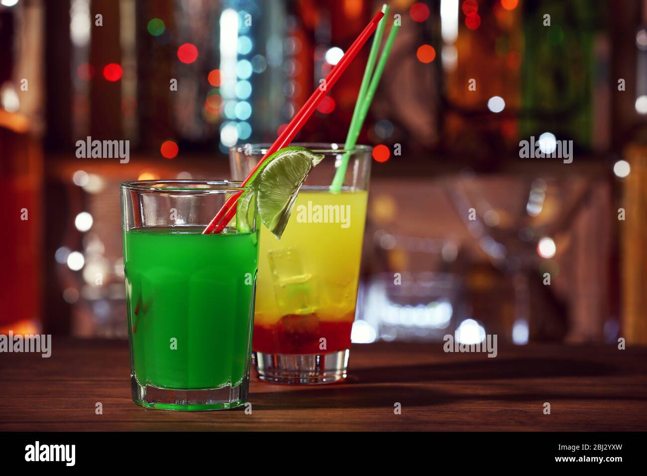 Glass of cocktail on the bar counter Stock Photo - Alamy