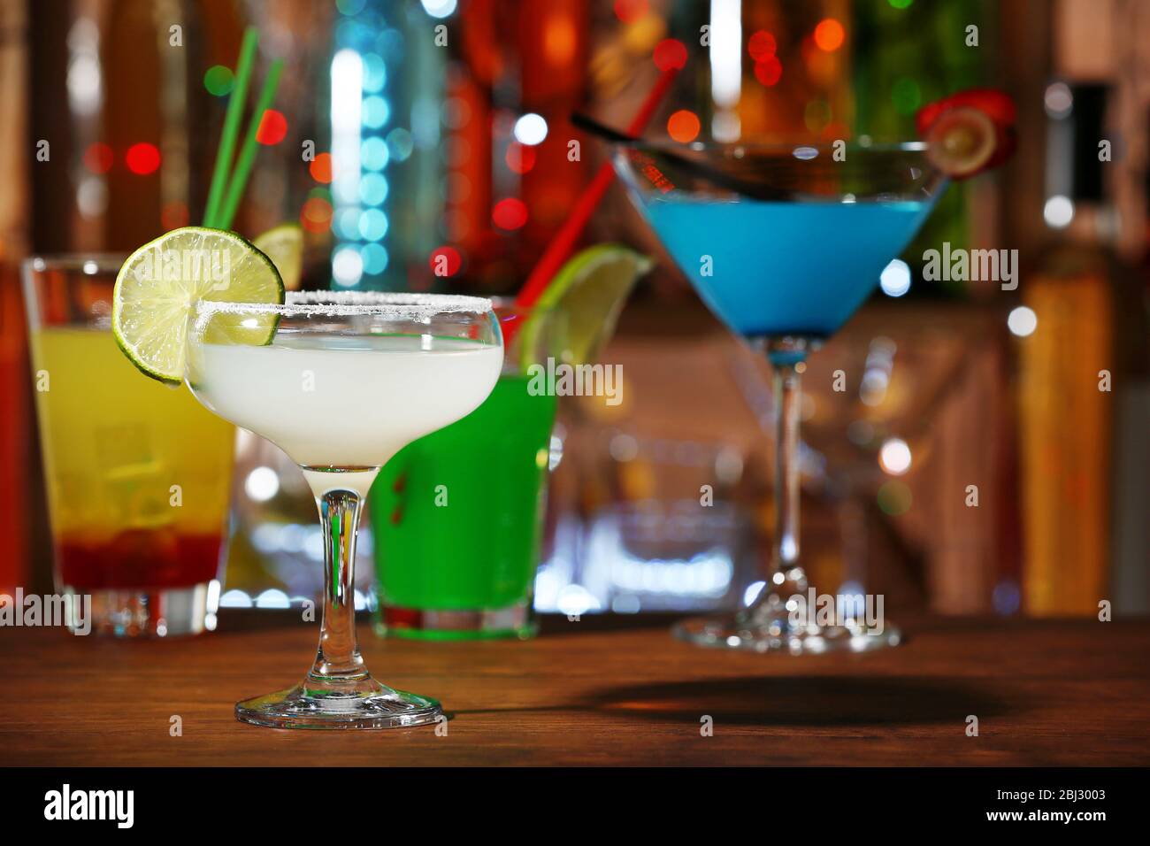 Glass of cocktail on the bar counter Stock Photo - Alamy