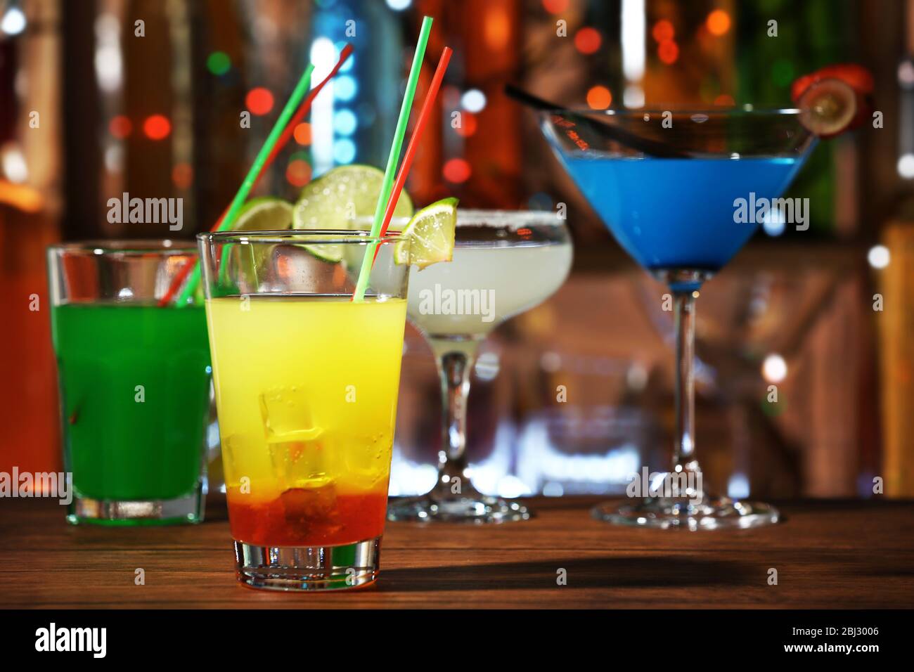 Glass of cocktail on the bar counter Stock Photo - Alamy