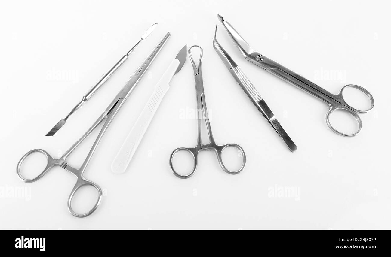 Surgery instruments isolated on white Stock Photo - Alamy