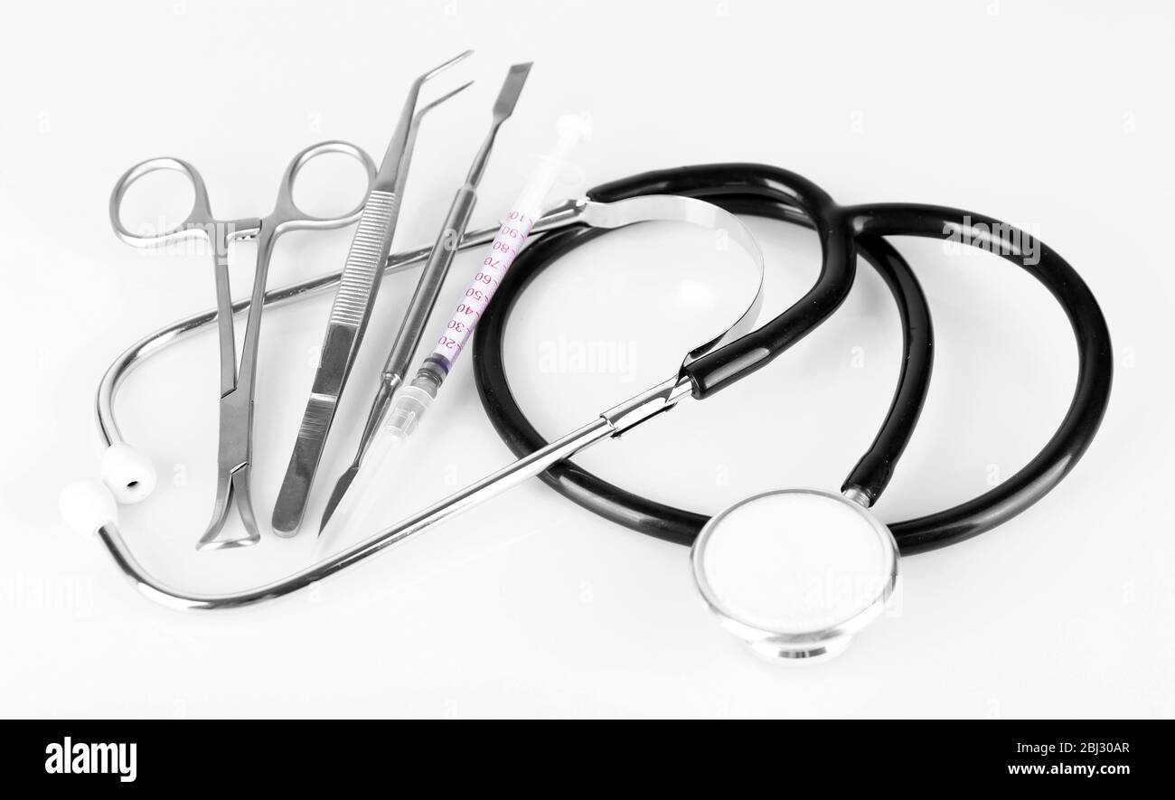 Stethoscope and medical instruments on white background, close up Stock ...