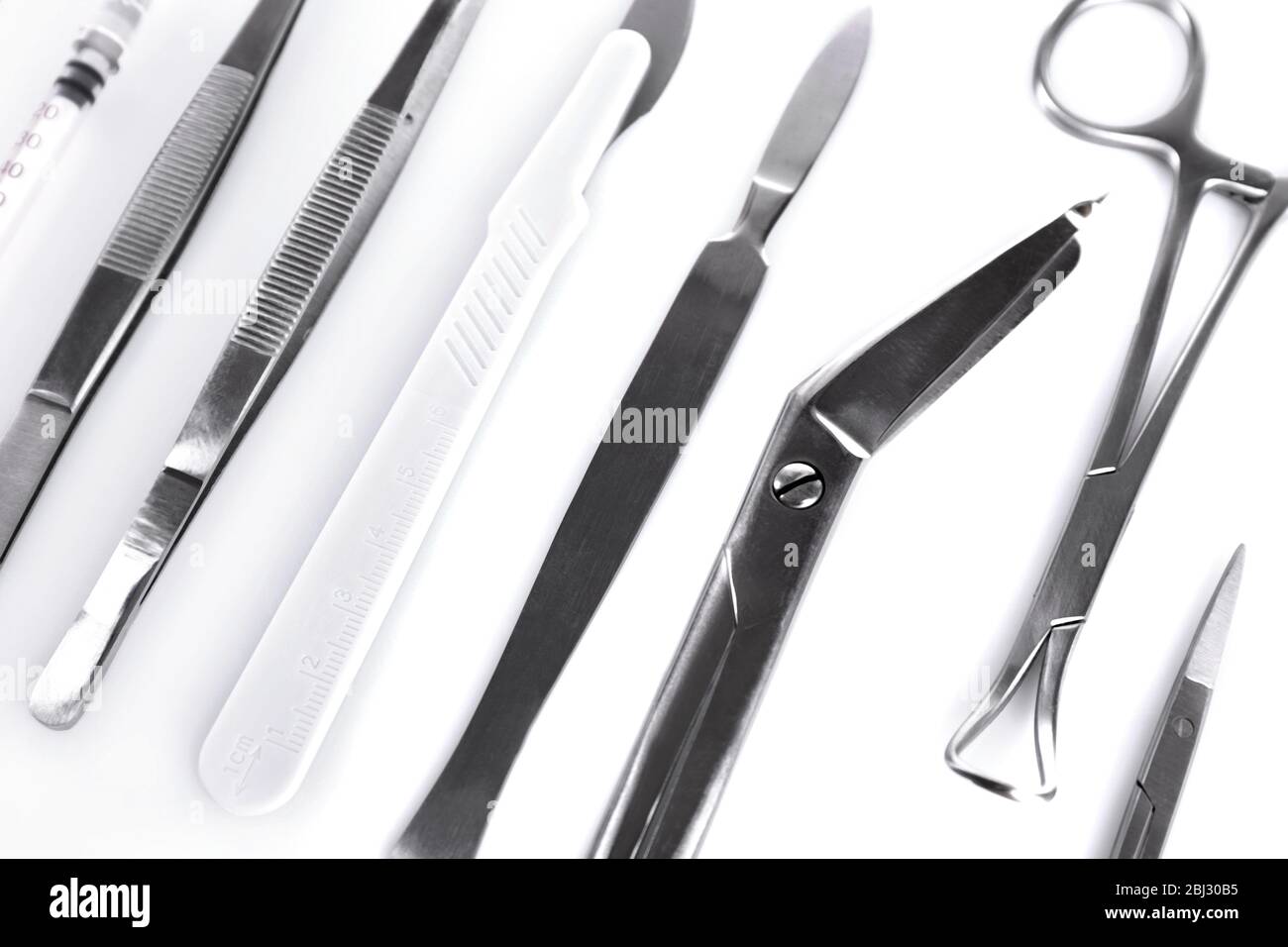 Surgery instruments isolated on white Stock Photo - Alamy
