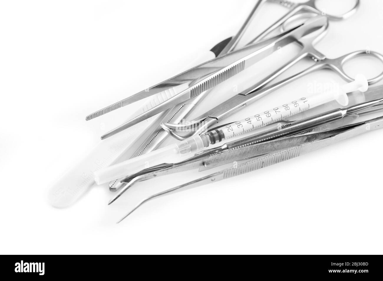 Surgery instruments isolated on white Stock Photo - Alamy