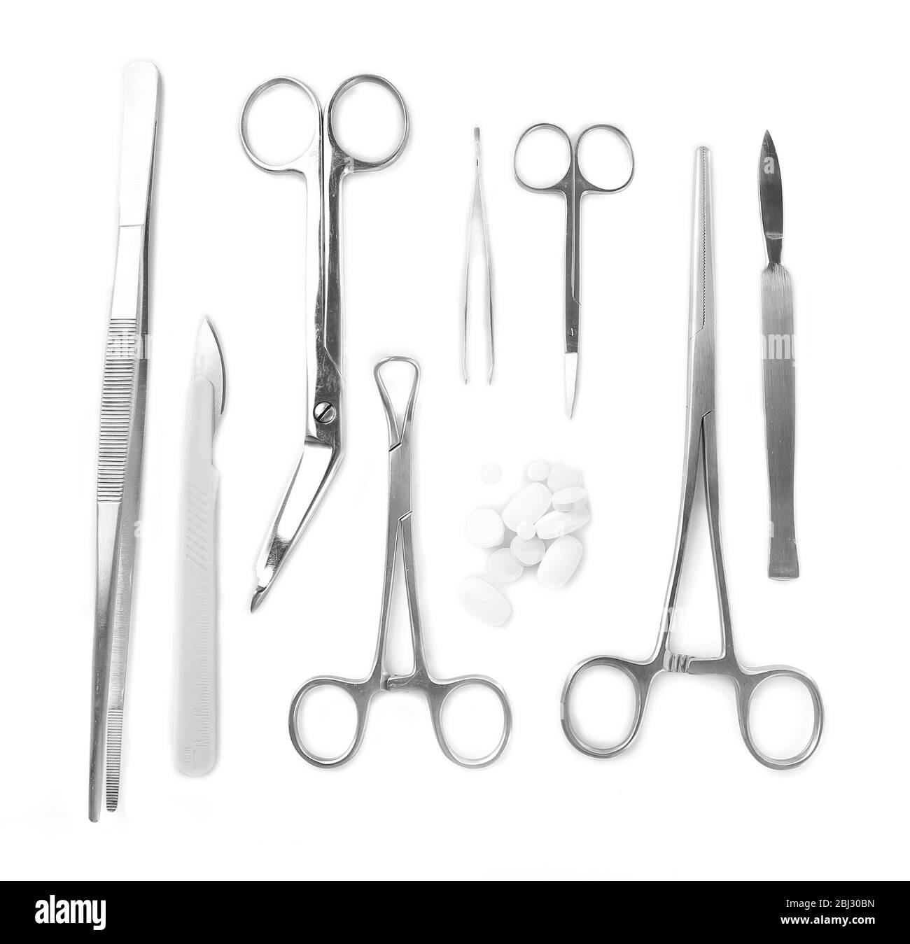 Surgery instruments isolated on white Stock Photo - Alamy