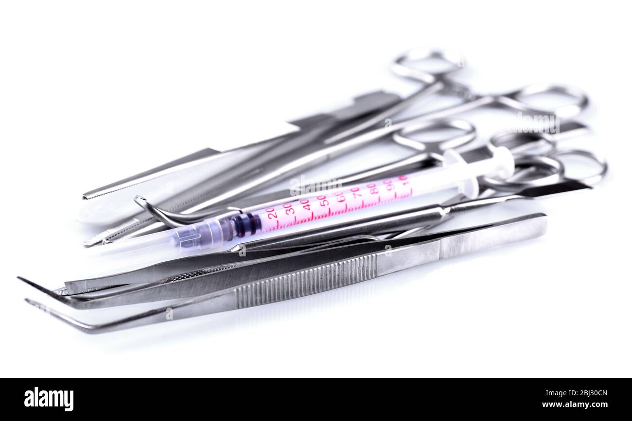 Surgery instruments isolated on white Stock Photo - Alamy