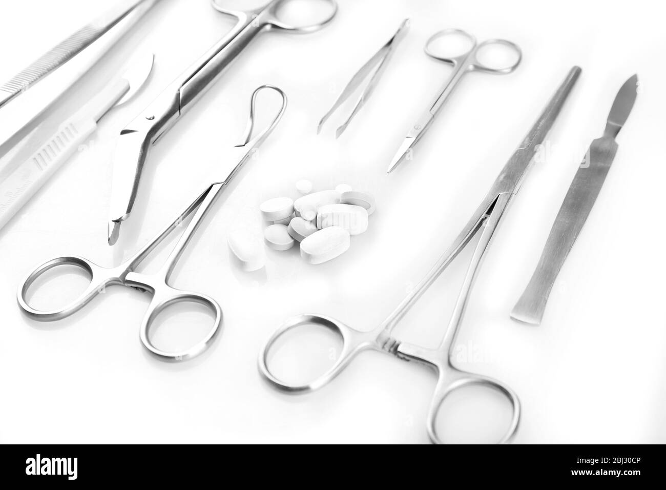 Surgery instruments isolated on white Stock Photo - Alamy