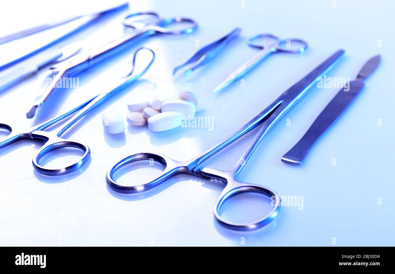Surgery instruments isolated on white Stock Photo - Alamy