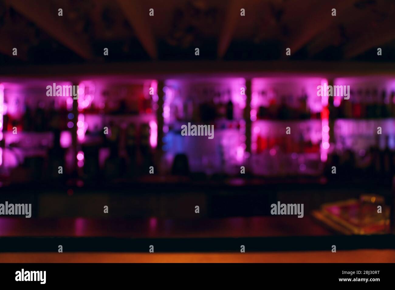 Purple bar counter Stock Photo - Alamy