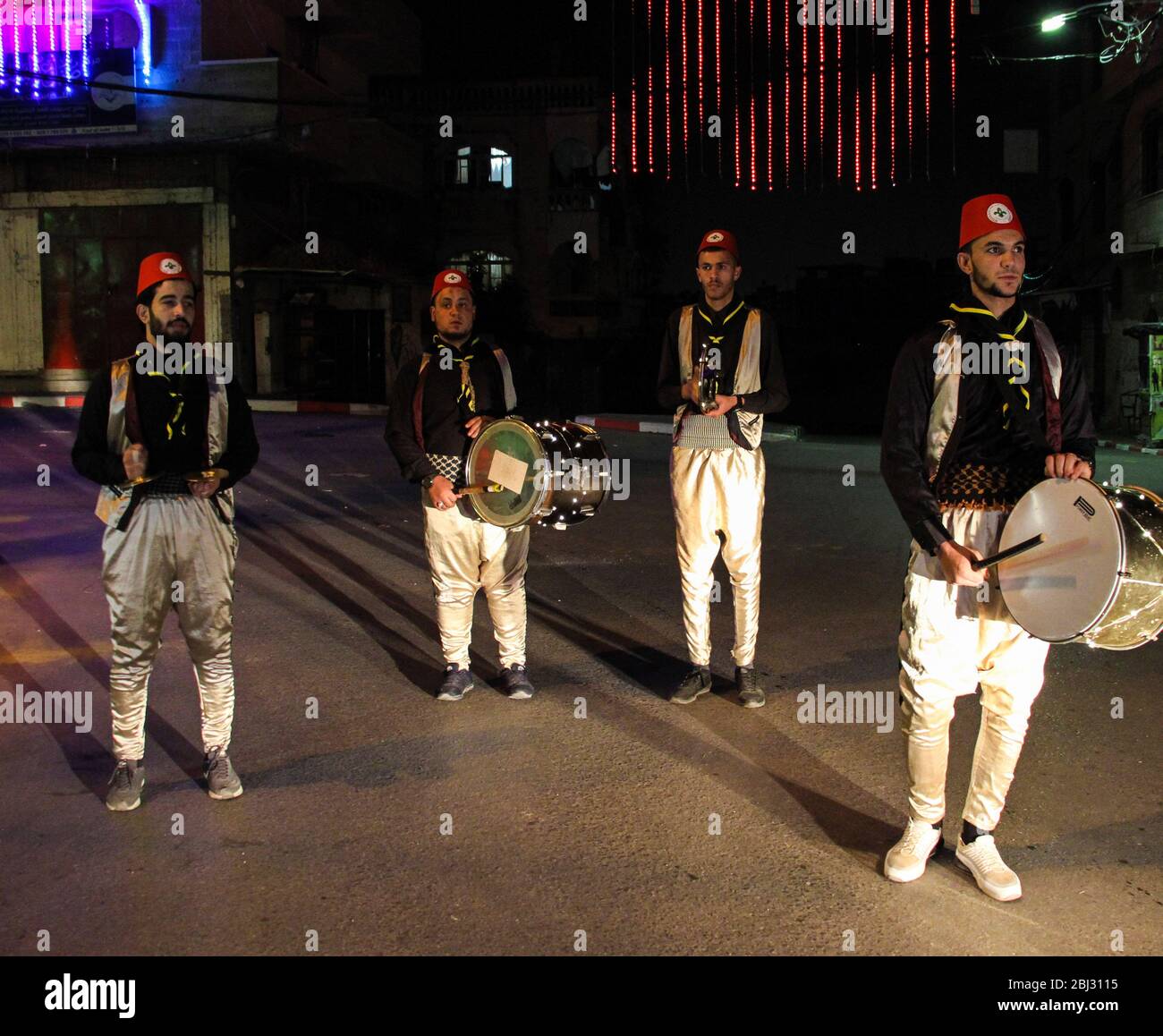 Gaza. 28th Apr, 2020. Members of a Palestinian traditional band ...
