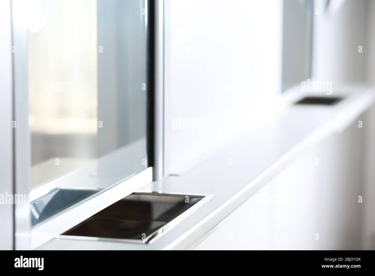 Cash department window Stock Photo - Alamy