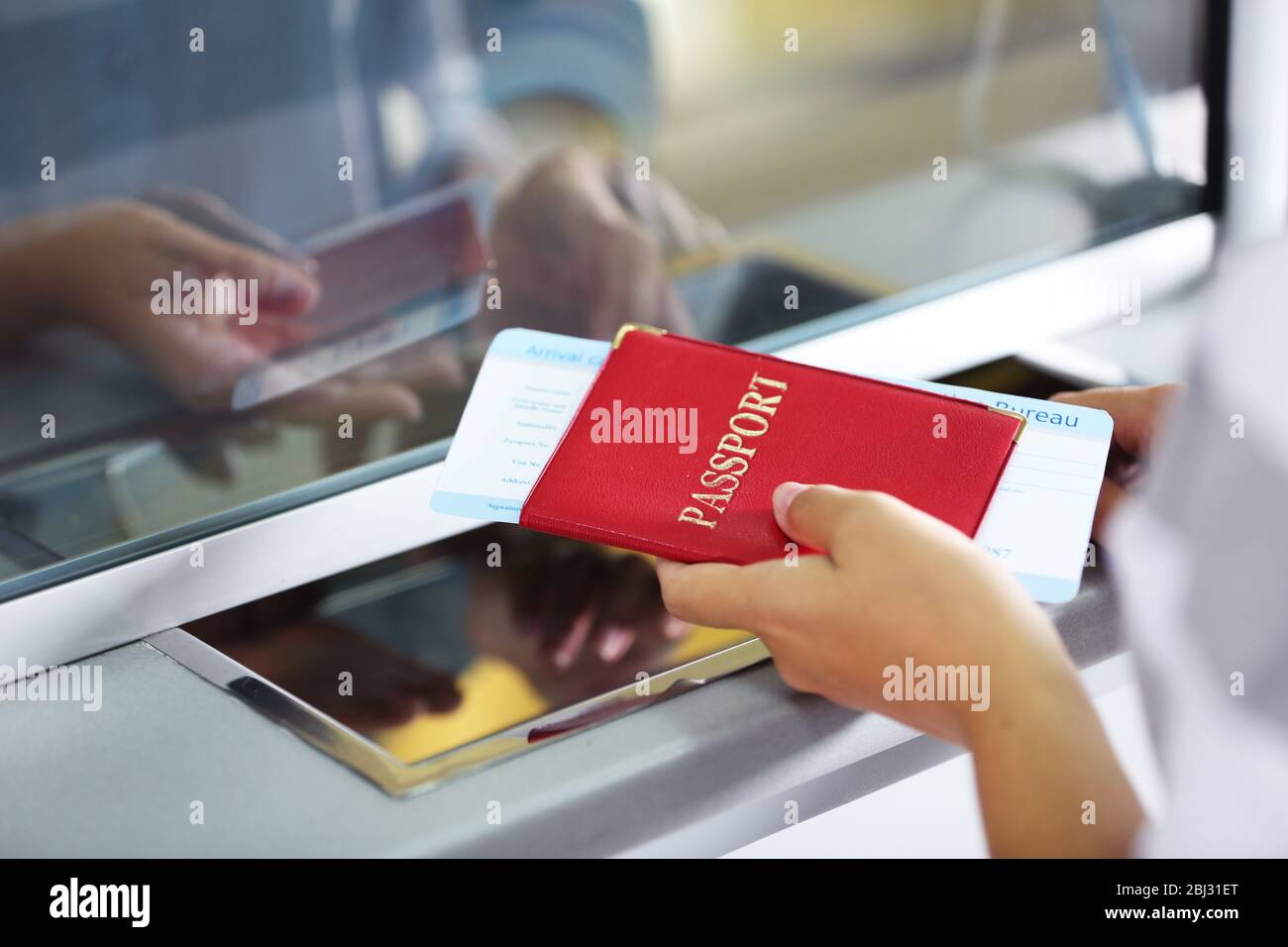Airport Check-In Counters With Passengers Stock Photo - Alamy