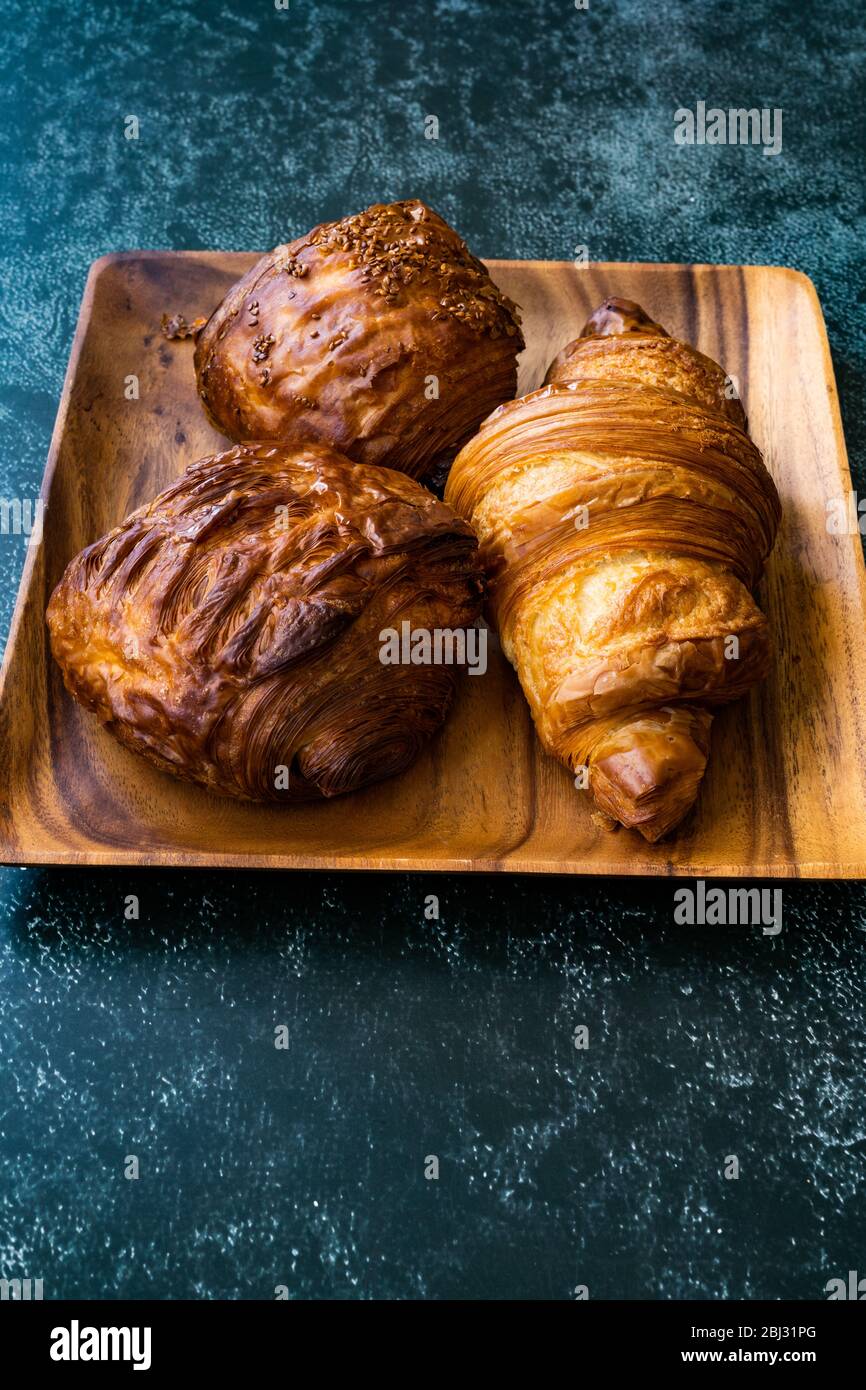 Assortment of Assorted Croissant Varieties om Wooden Plate / Variety of ...