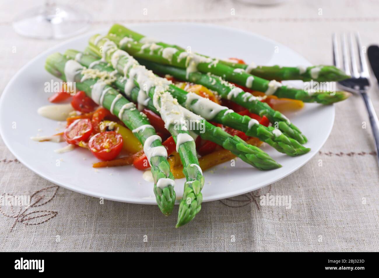 Delicious vegetables dish on served table Stock Photo - Alamy