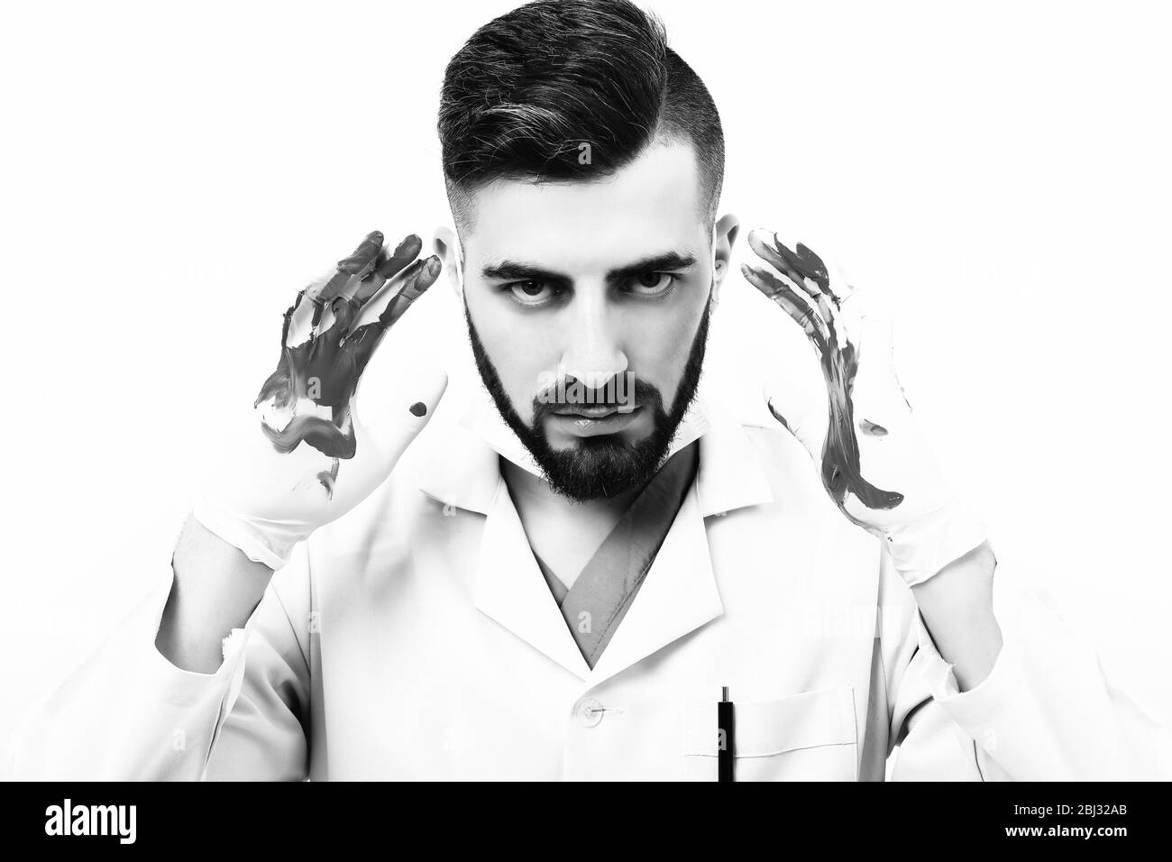 Man with beard in medical uniform. Doctor with confident face ...