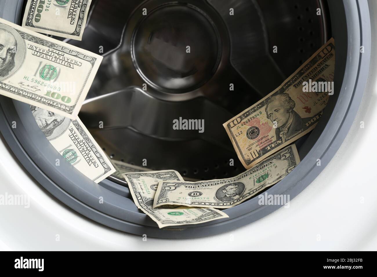 Dollar banknotes in washing hi-res stock photography and images - Alamy