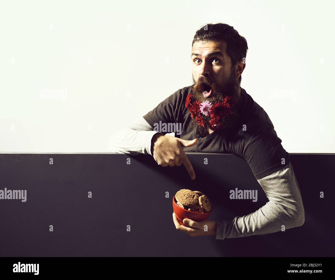 handsome bearded man with stylish mustache and long beard with colorful ...