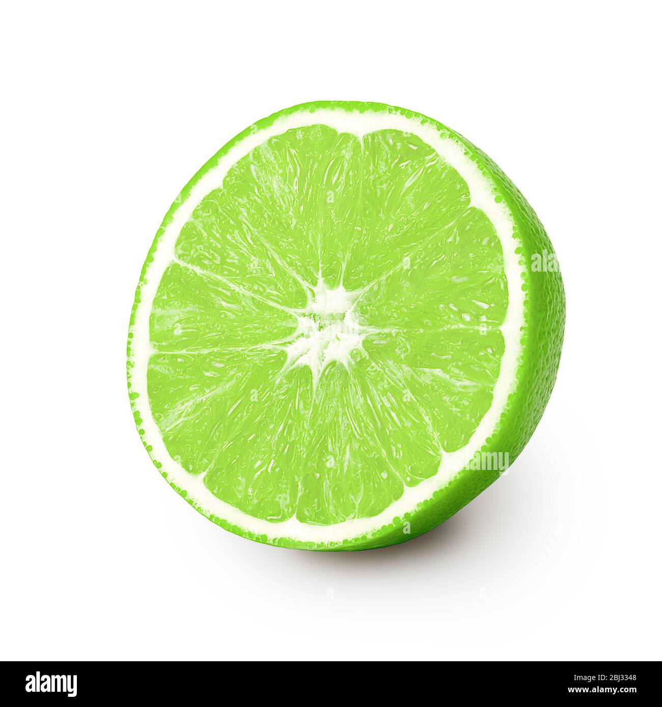 Isolated lime. One half ripe lime isolated on a white background ...