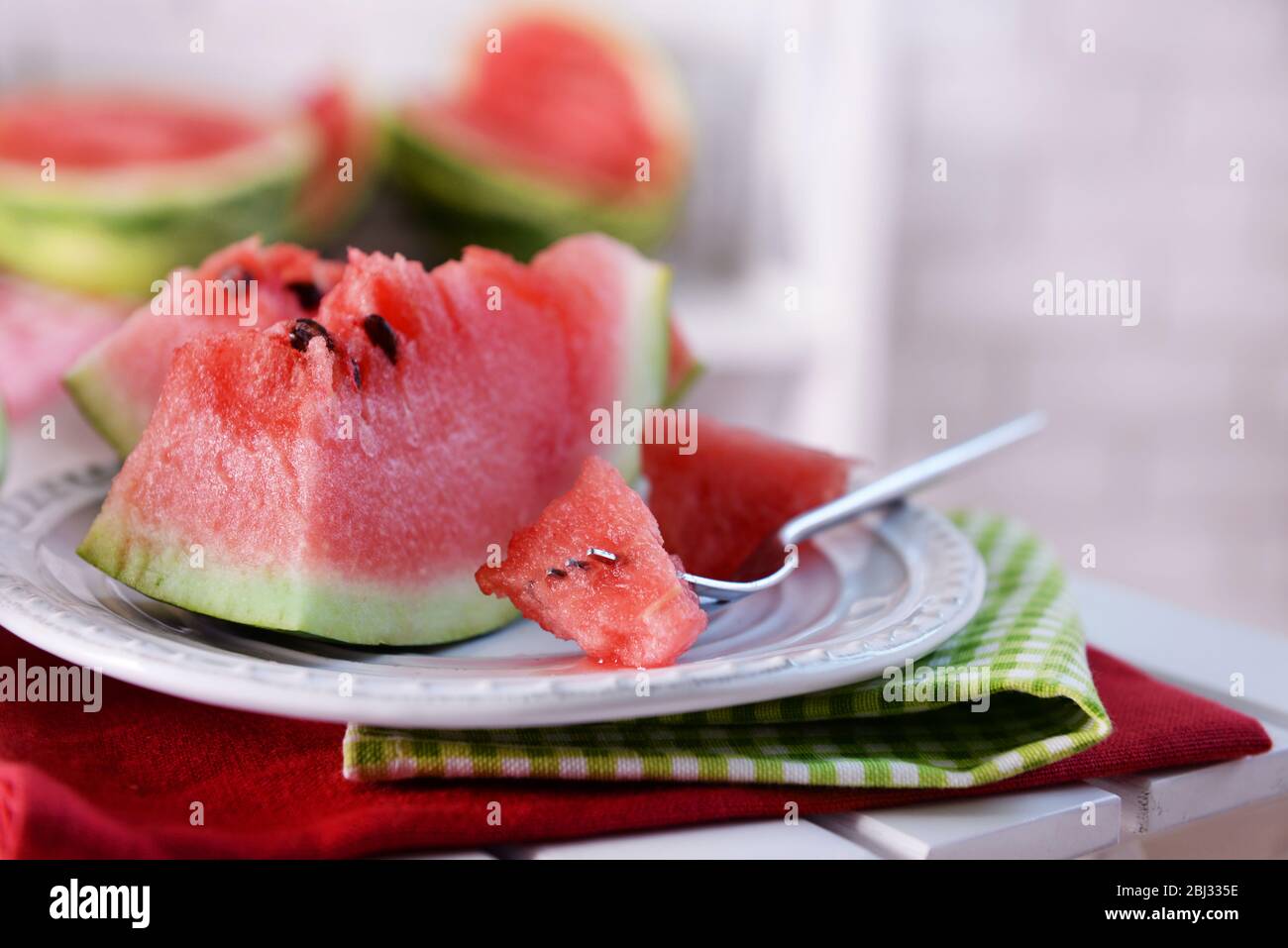 Sliced watermelon on plate closeup Stock Photo - Alamy