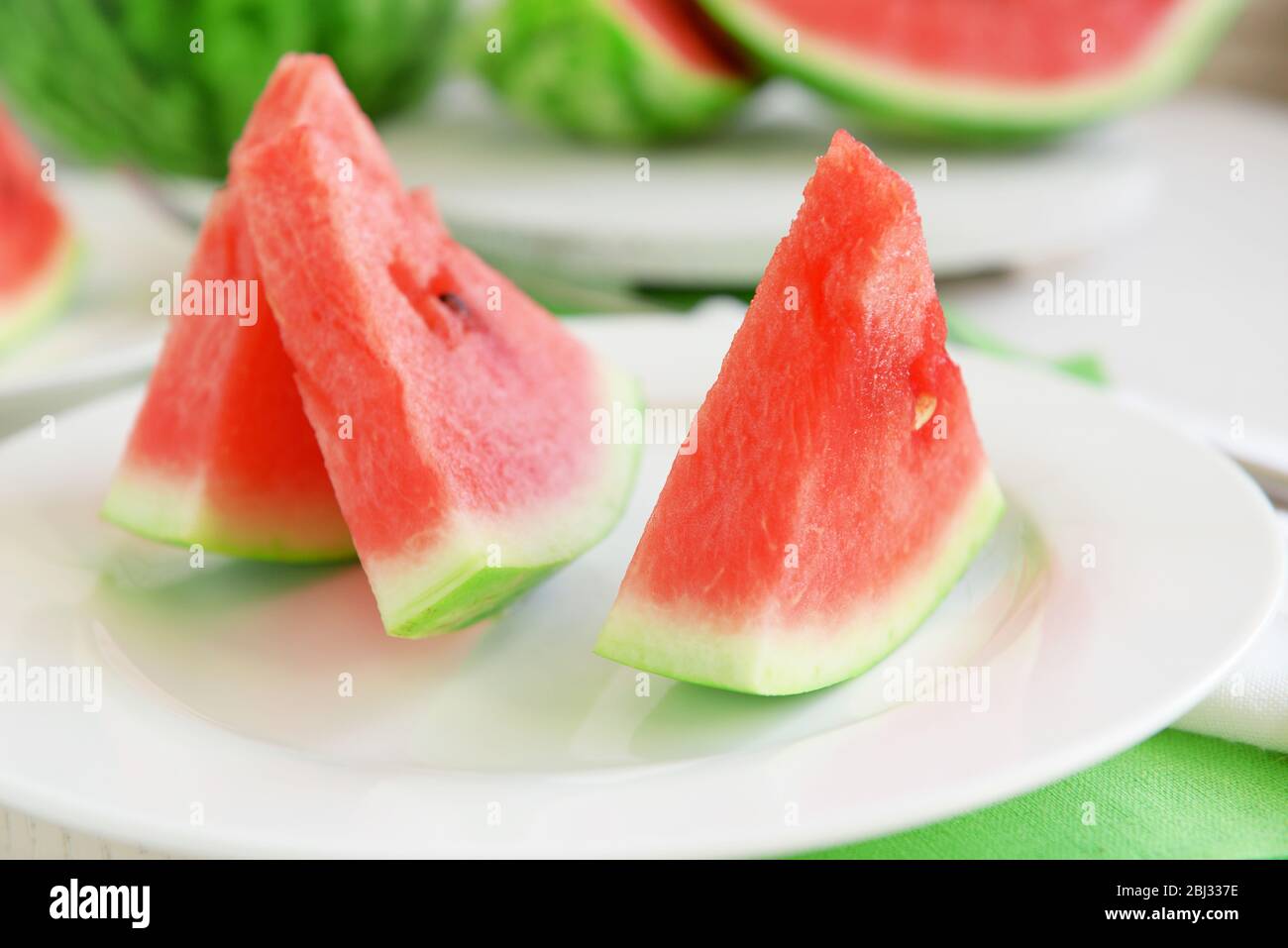Sliced watermelon on plate closeup Stock Photo - Alamy