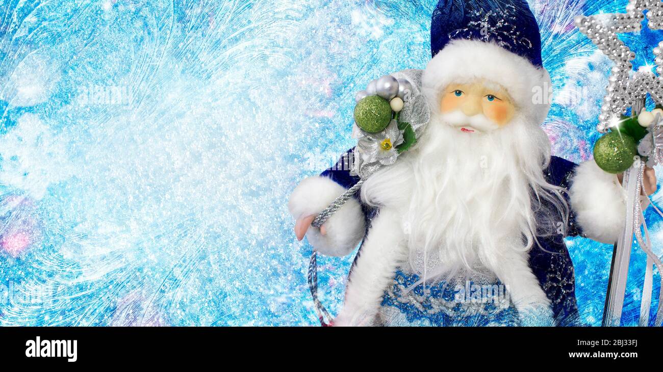 Santa Claus on a blue background Stock Photo - Alamy