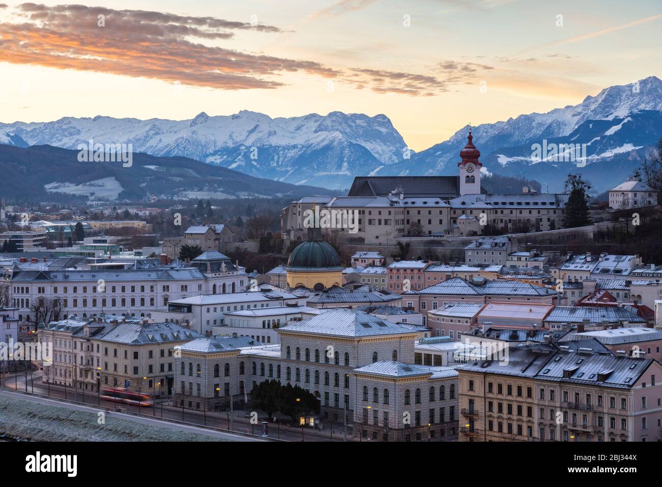 View towards Nonnberg Abbey with mountains in the background at sunrise ...
