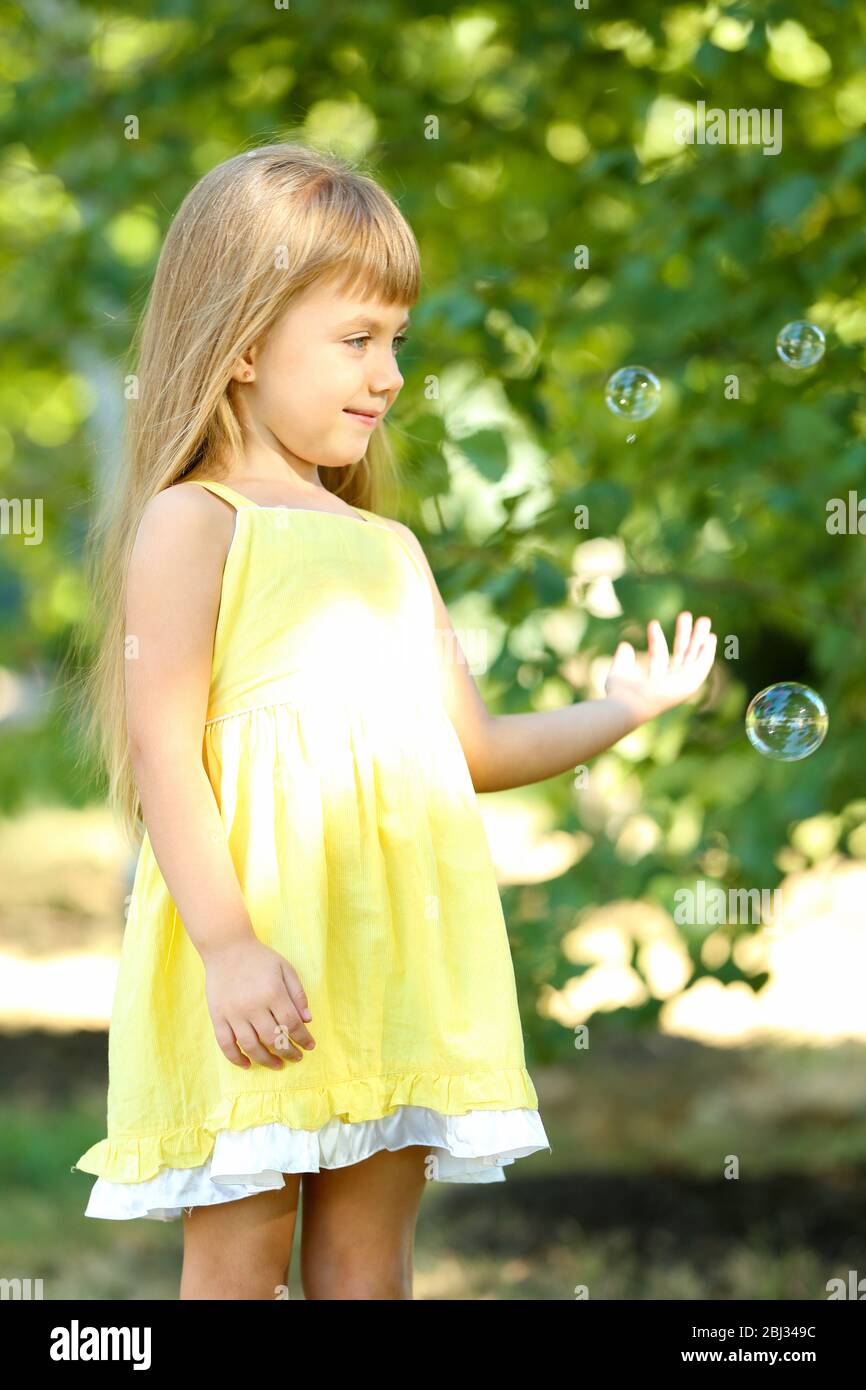 Little girl outside Stock Photo - Alamy