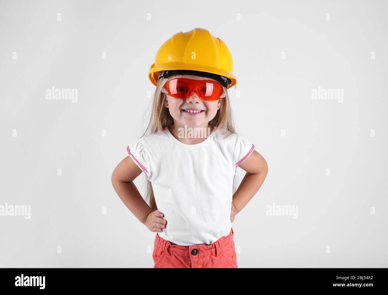 Little girl with toy tools isolated on white Stock Photo - Alamy