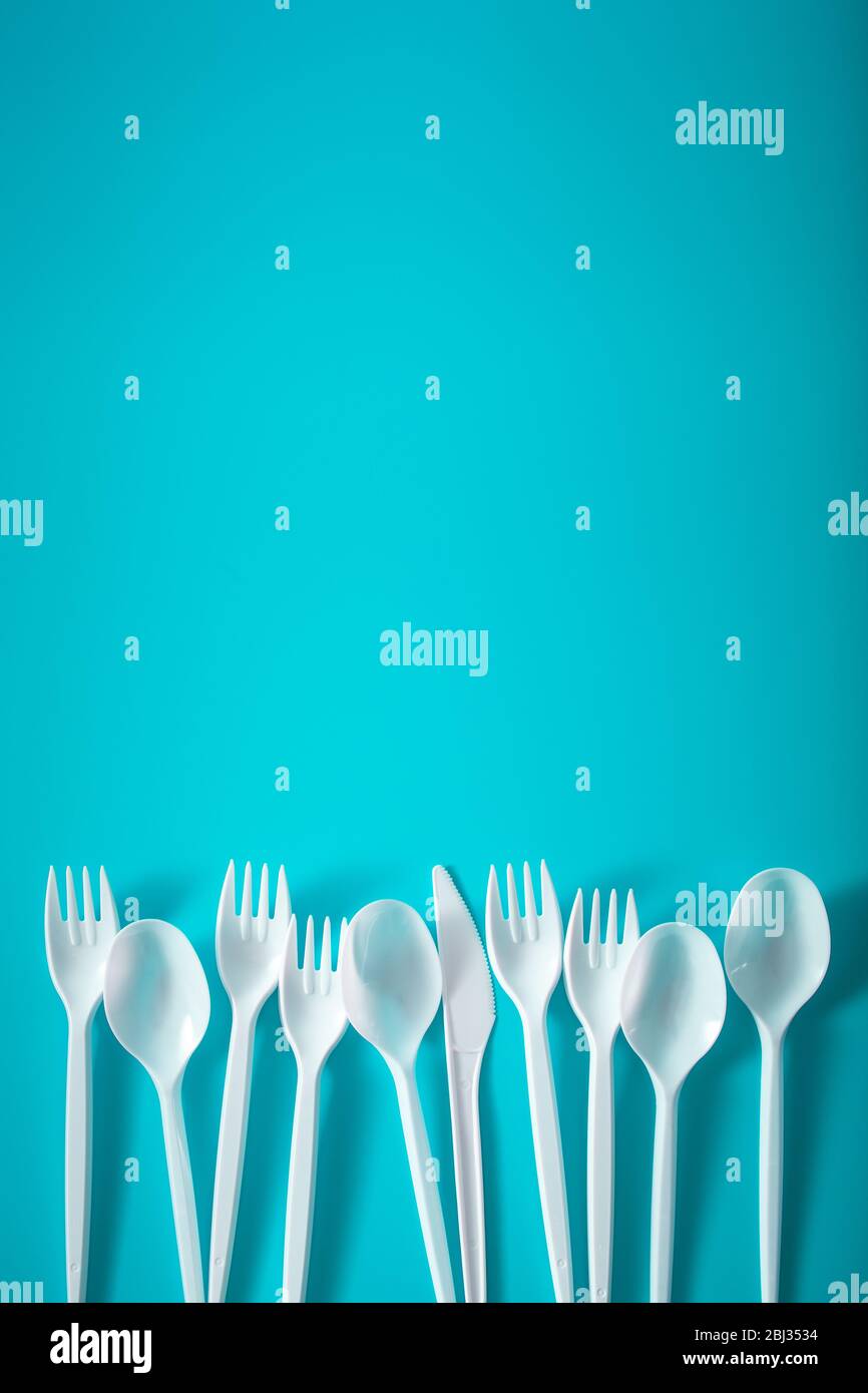 single use plastic forks, spoons. concept of recycling plastic, plastic ... single use plastic forks, spoons. concept of recycling plastic, plastic ...