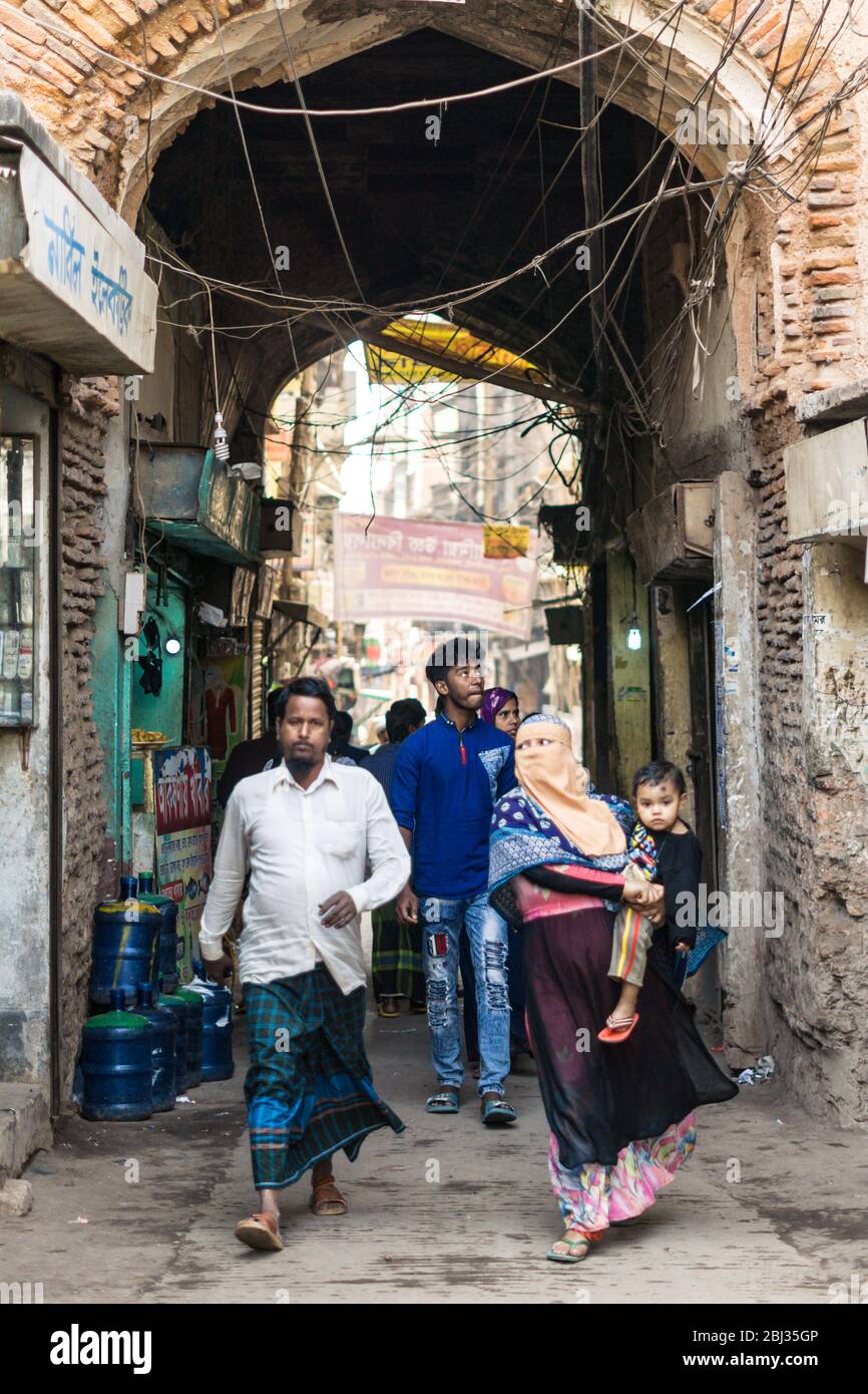 Dhaka / Bangladesh - January 14, 2019: Muslim people walking under ...