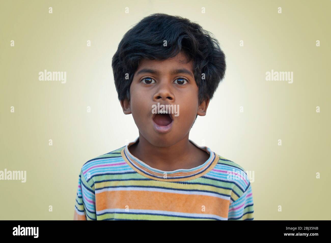 Portrait of Rural boy looking surprised Stock Photo - Alamy