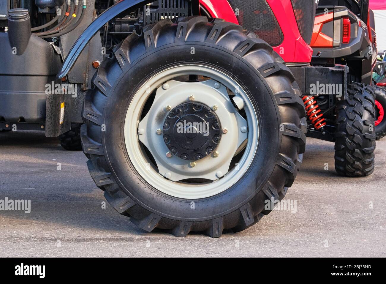 Tractor wheel, close up. Agricultural machinery Stock Photo - Alamy