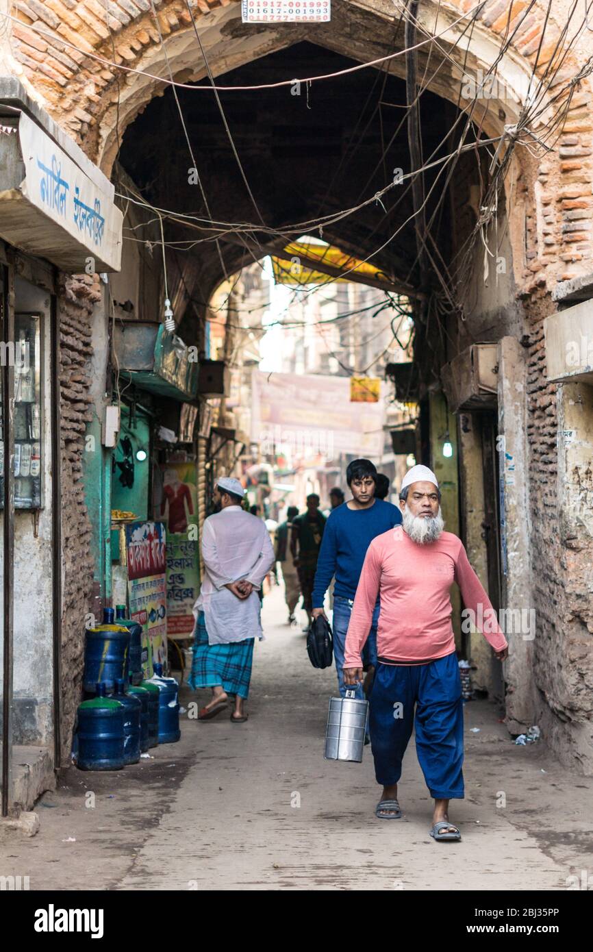Dhaka / Bangladesh - January 14, 2019: Muslim people walking under ...
