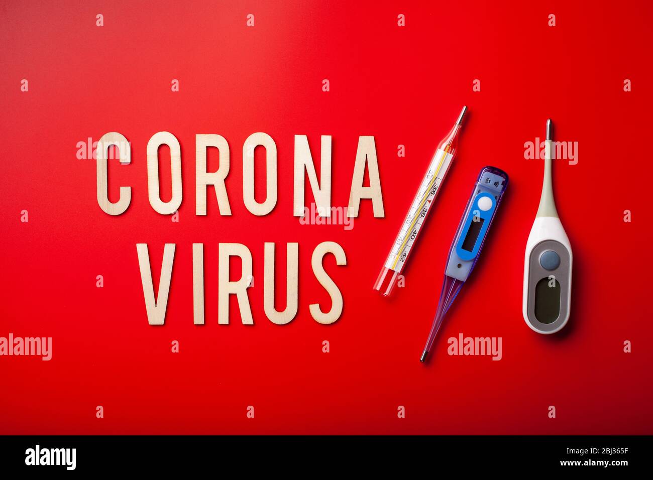 coronavirus word text wooden letter on red background corona virus ...