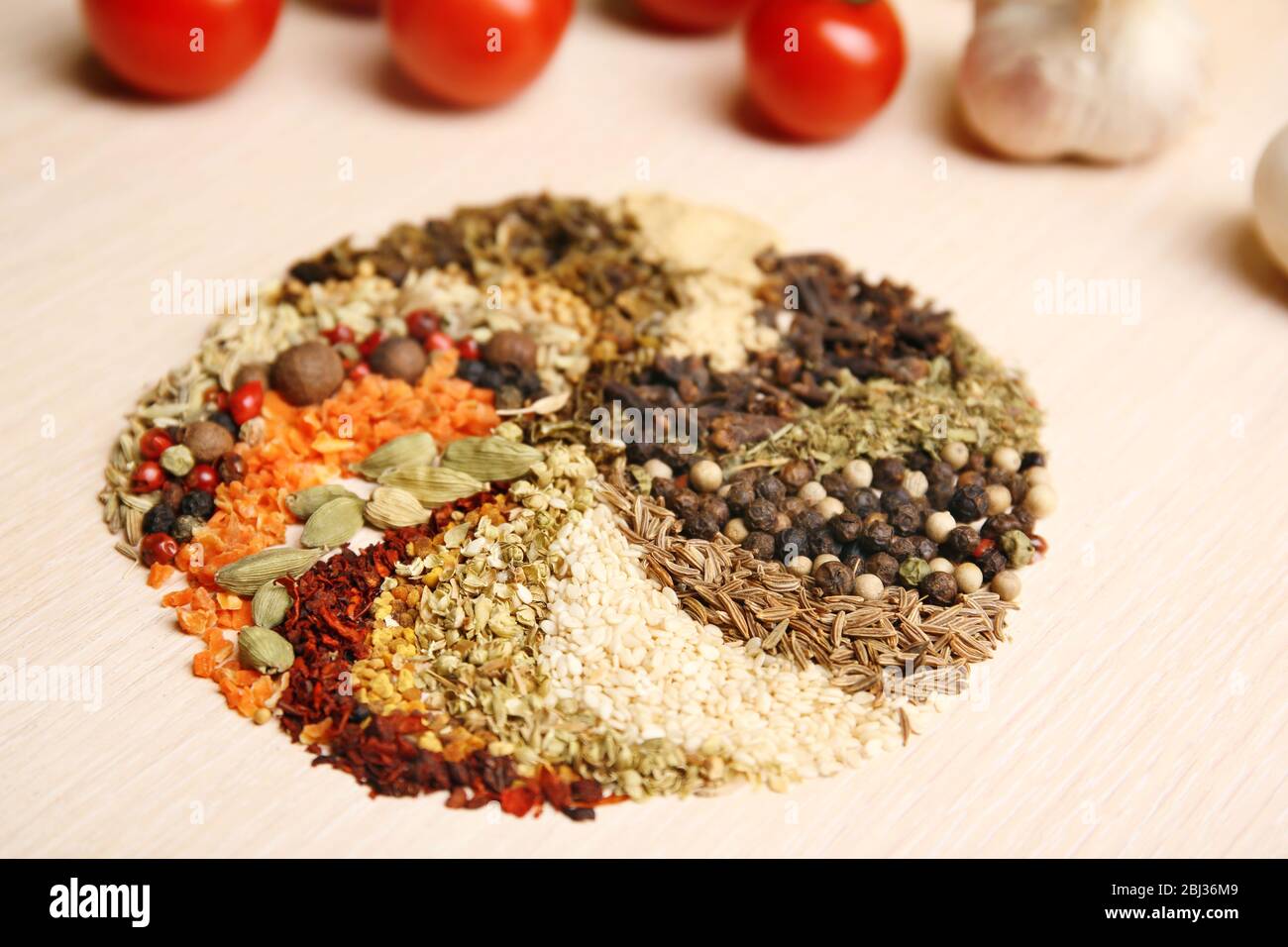 Variety of spices in the shape of a circle on the kitchen table Stock ...