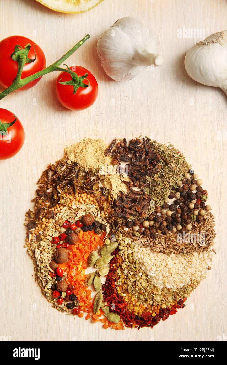 Variety of spices in the shape of a circle on the kitchen table Stock ...