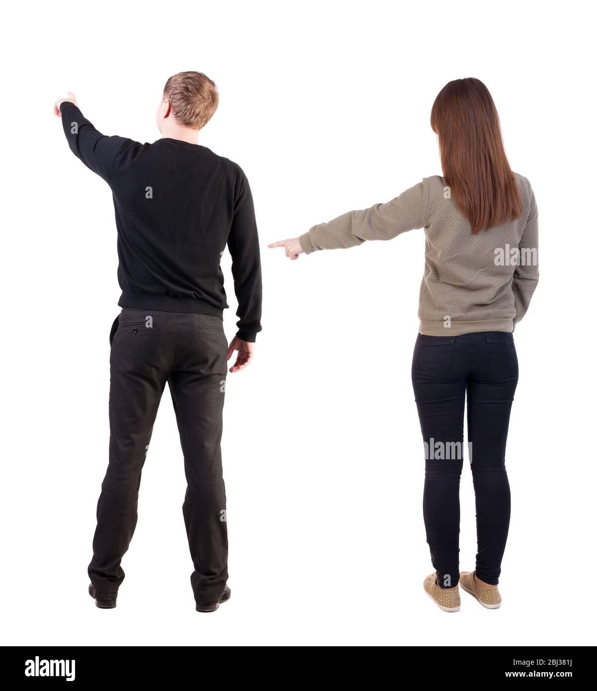 Back view of couple in sweater pointing. Rear view people collection ...