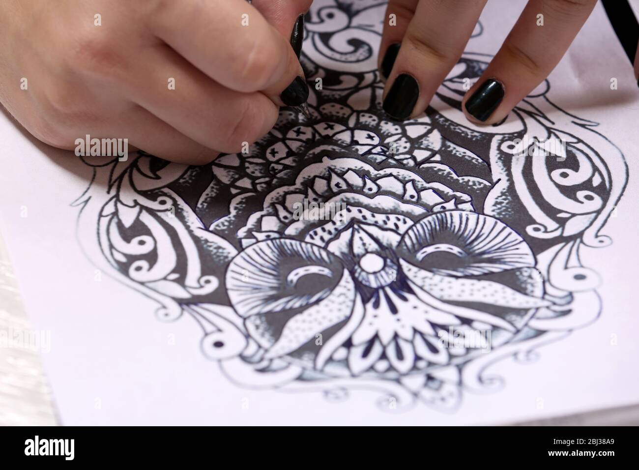 Process of making a sketch for tattoo close-up Stock Photo - Alamy