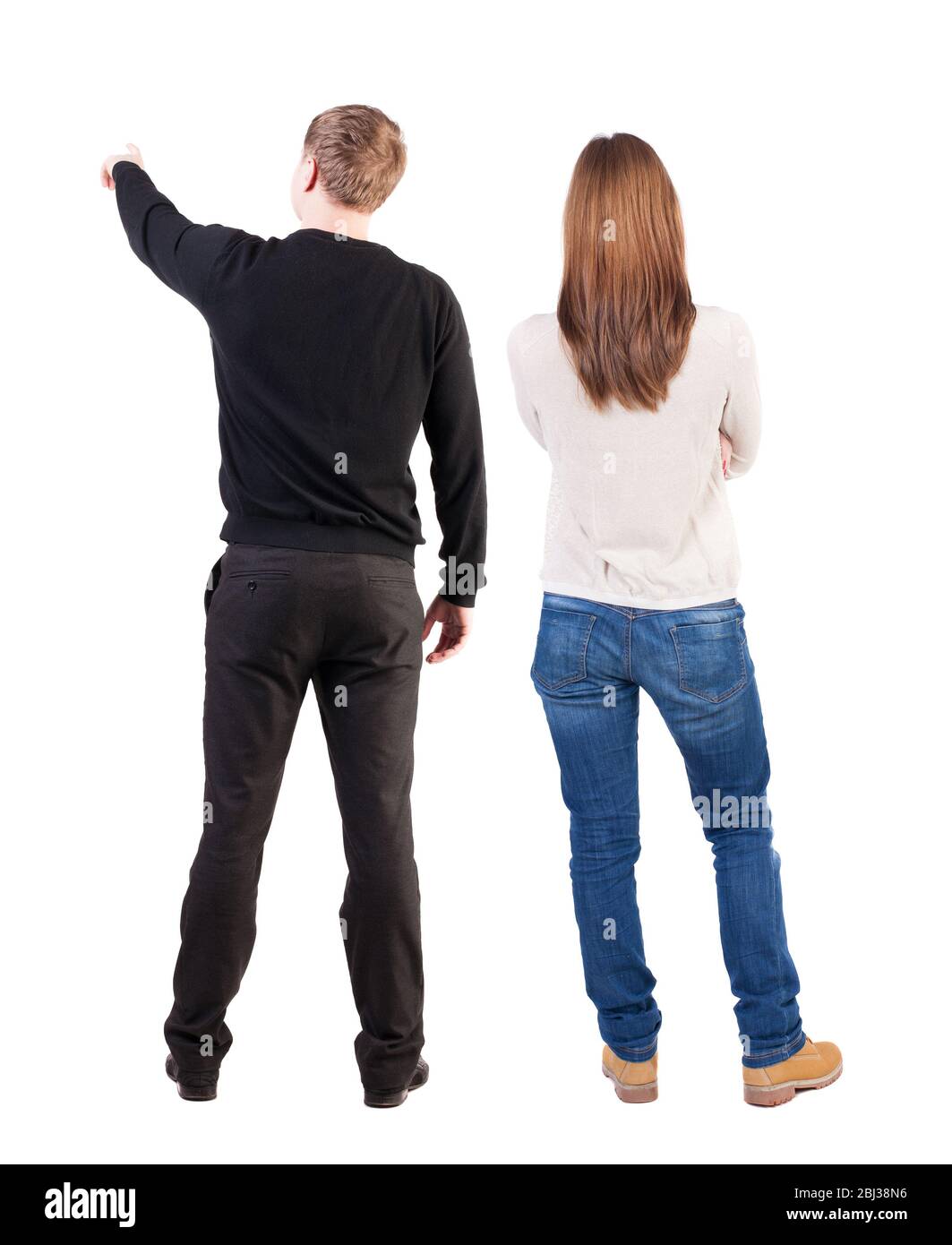 Back view of couple in sweater pointing. Rear view people collection ...