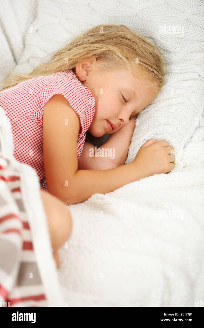 Sleeping little girl closeup Stock Photo - Alamy